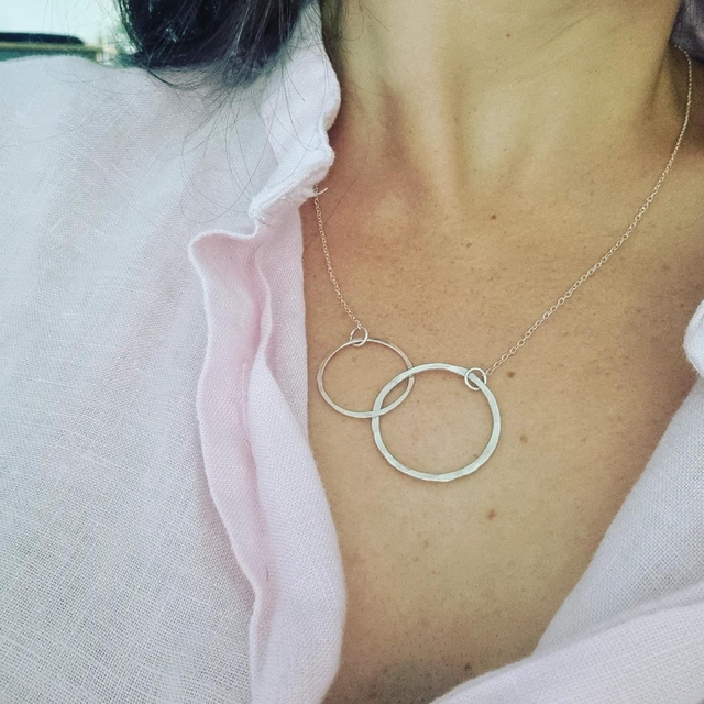 Two interlinked Mini and Me circle necklace