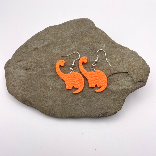 Orange brachiosaurus earrings | Rocket & Goose